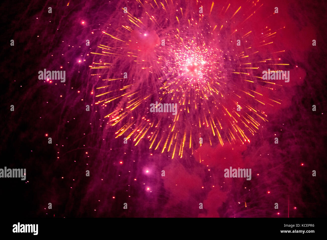 fireworks explosions in the night sky. Close-up Stock Photo - Alamy