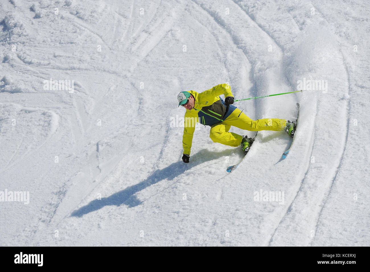 A skier carves a turn photographed from above Stock Photo - Alamy