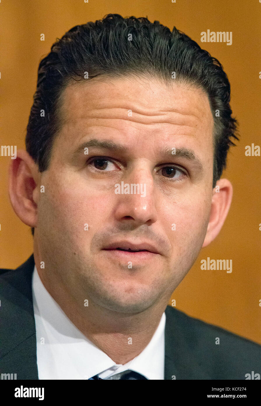 United States Senator Brian Schatz (Democrat of Hawaii) listens as ...