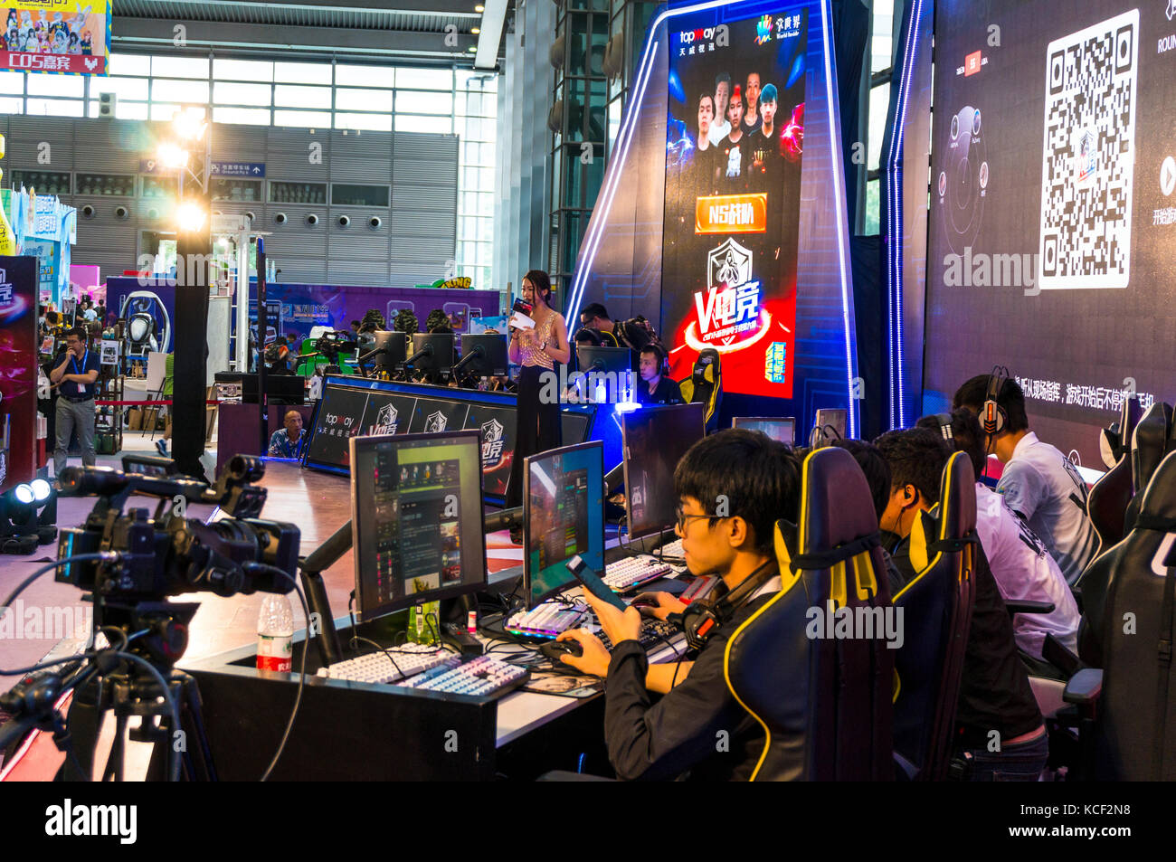 Video gamers in a multiplayer head to head competition at 2017 Shenzhen ...