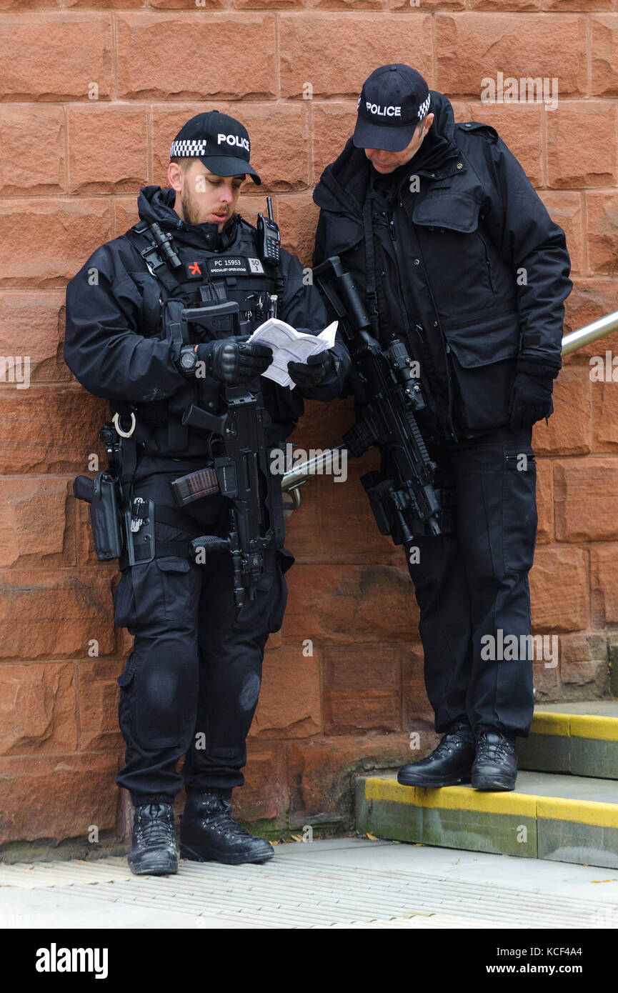 Manchester, UK. 4th October 2017. Armed police guard the conference ...