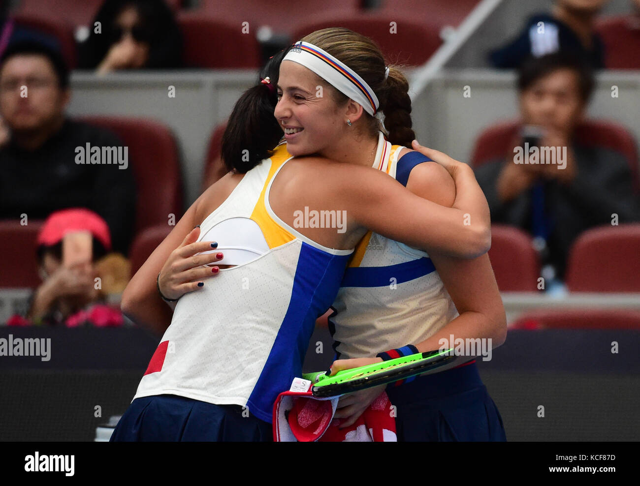 Beijing, China. 5th Oct, 2017. Jelena Ostapenko of Latvia hugs with ...