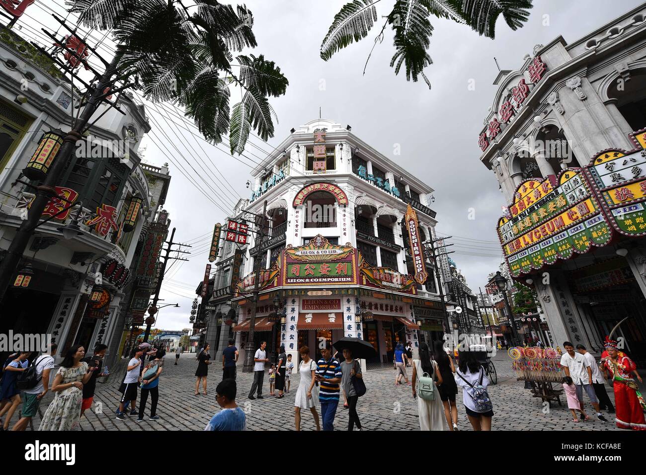 Haikou. 5th Oct, 2017. Tourists visit a movie town in Haikou, south ...
