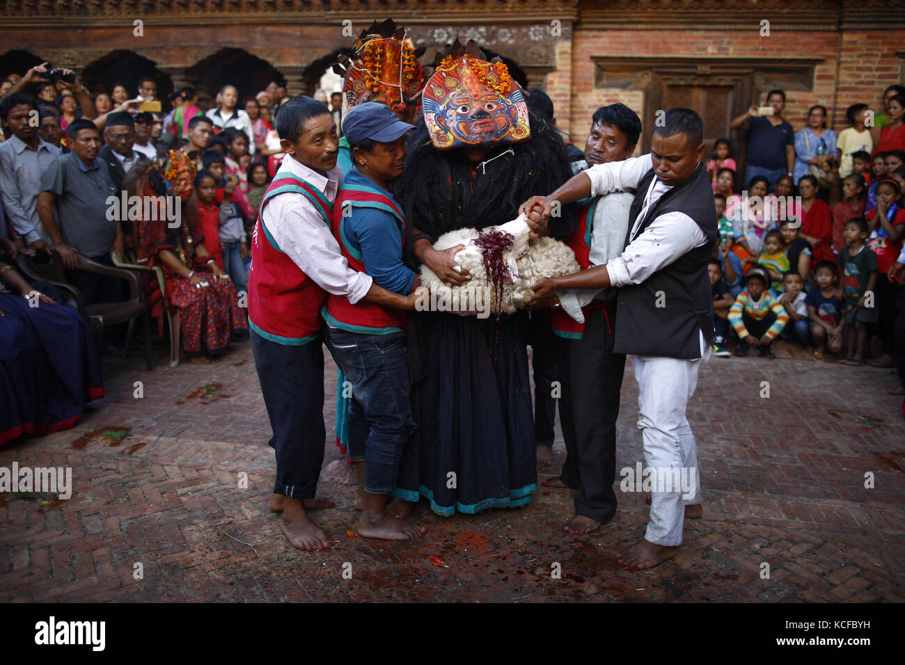 Lalitpur, Nepal. 5th Oct, 2017. A Nepalese masked person dressed as a ...
