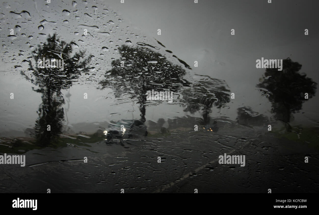 Paderborn, Germany. 05th Oct, 2017. Heavy rain hits the windshield of a ...