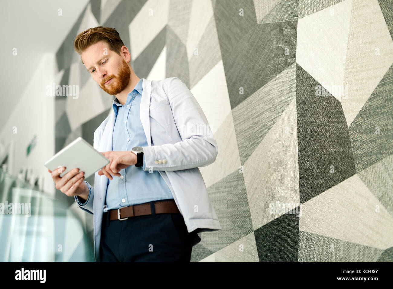 Business people using devices Stock Photo - Alamy