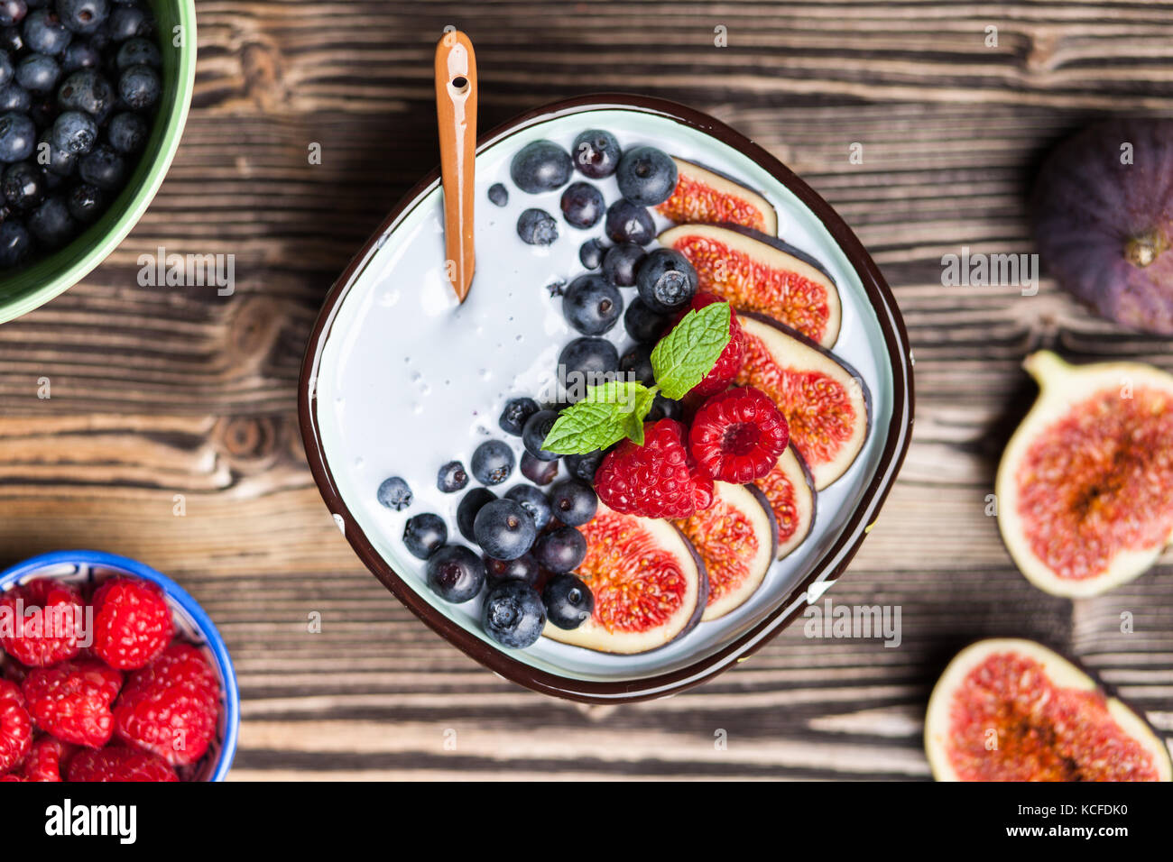 Delicious yoghurt bowl with blueberries, raspberry, figs Stock Photo ...