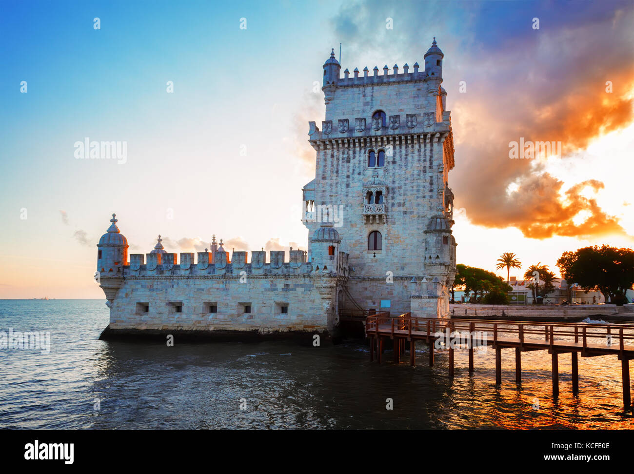 Torre of Belem at hign tide in sunset light, famouse landmark of Lisbon ...