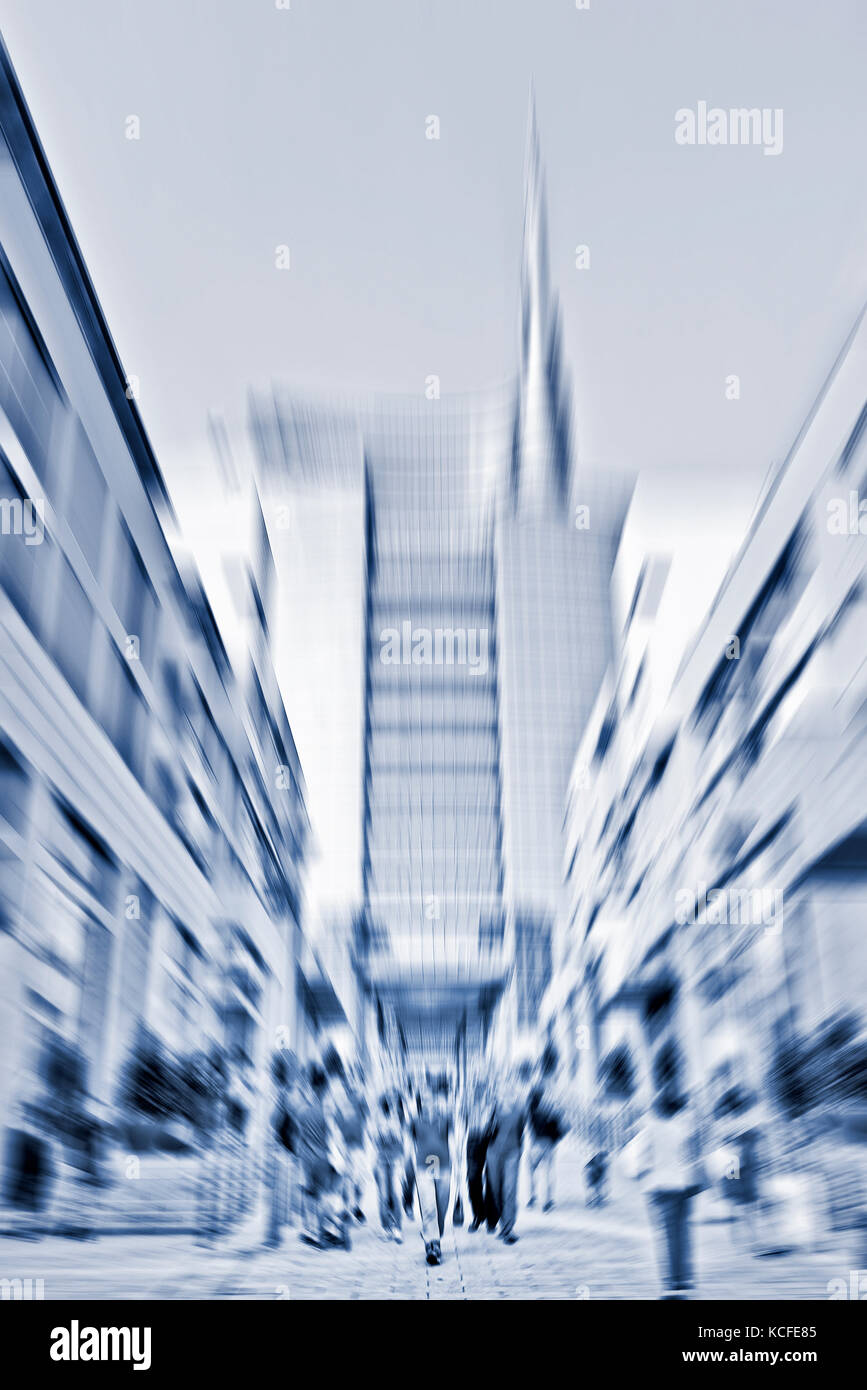 Blurred movement View of people walking in a commercial street Stock ...