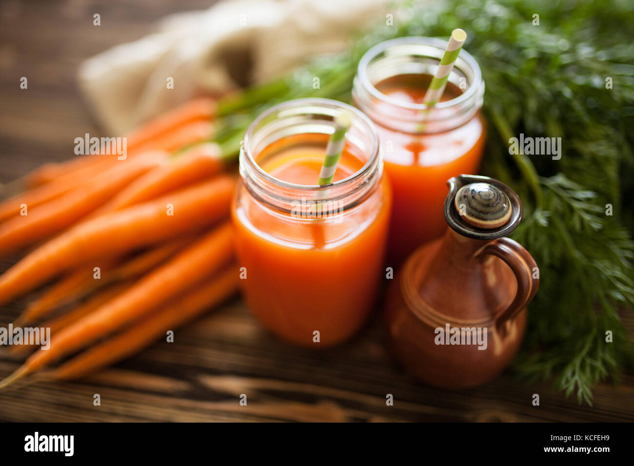 Fresh carrot juice in a bottle Stock Photo - Alamy