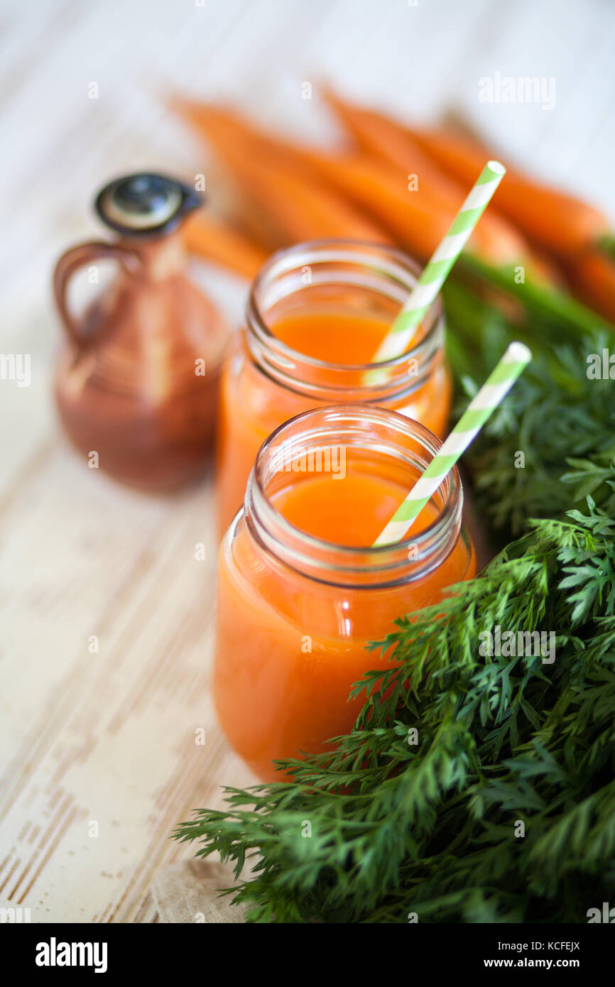Fresh carrot juice in a bottle Stock Photo - Alamy