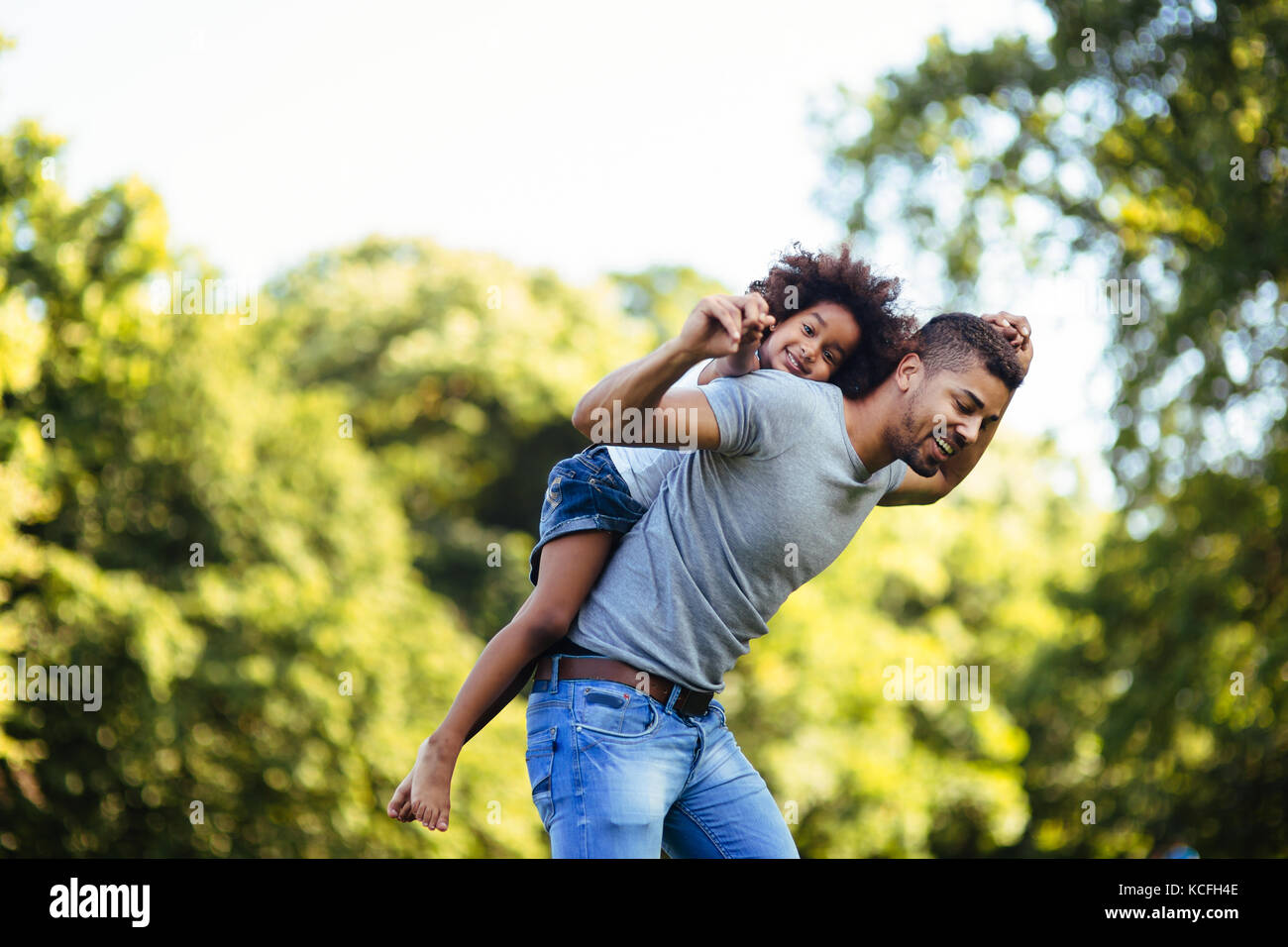 Father embrace child back hi-res stock photography and images - Alamy