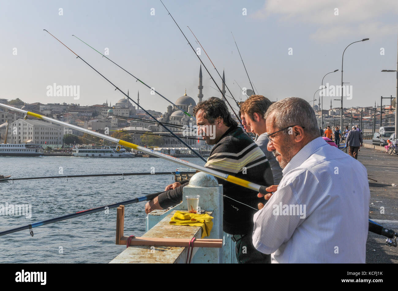fishing on Galata Bridge, Istanbul, Turkey Stock Photo - Alamy