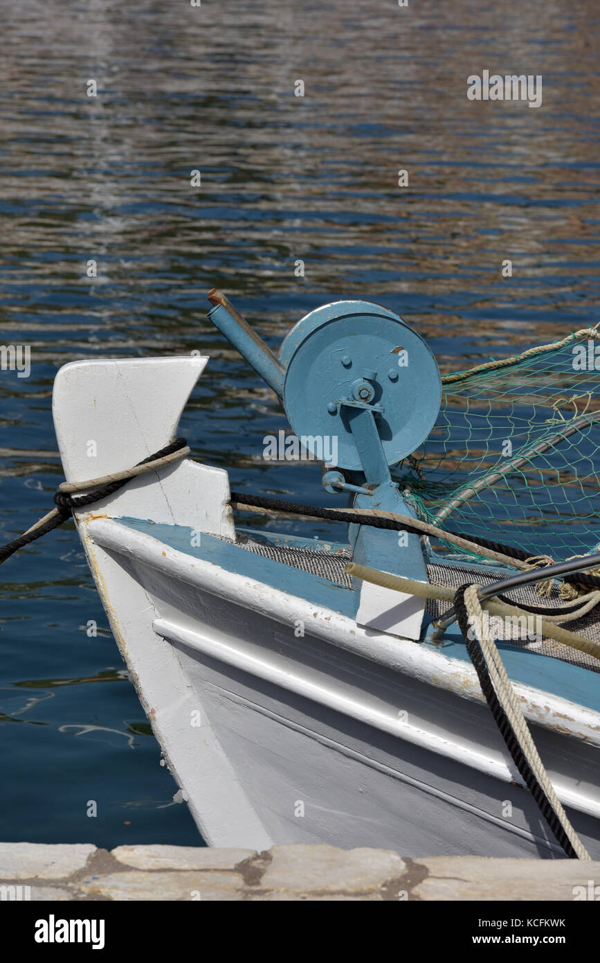 The bows of a small inshore greek fishing boat in a crystal clear ...
