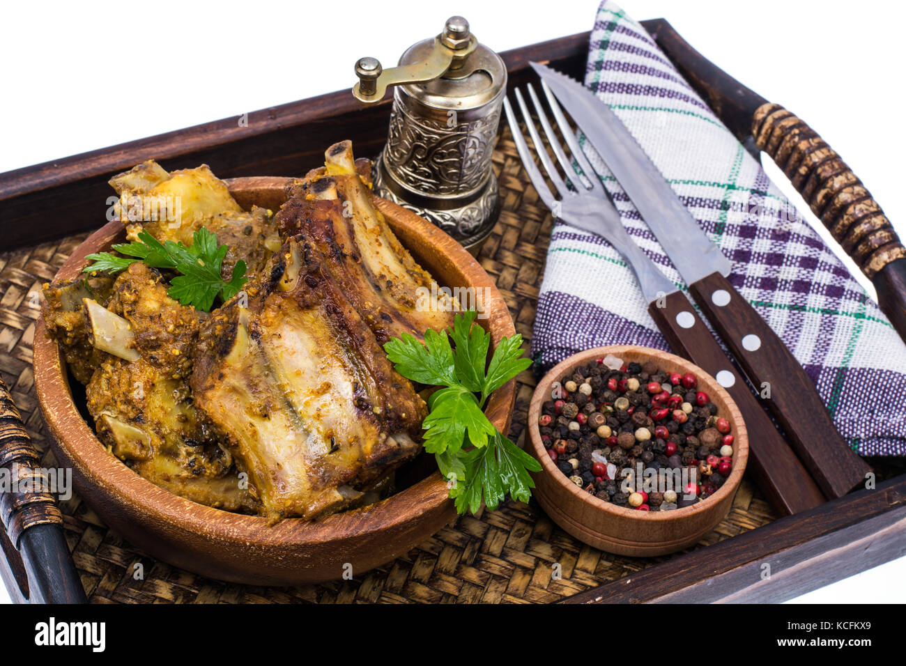 Tray, wooden bowl with spicy ribs, ketchup Stock Photo - Alamy