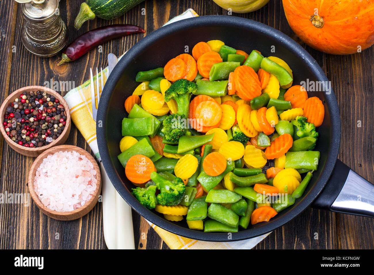Dishes in frying pan, mix frozen vegetables Stock Photo - Alamy
