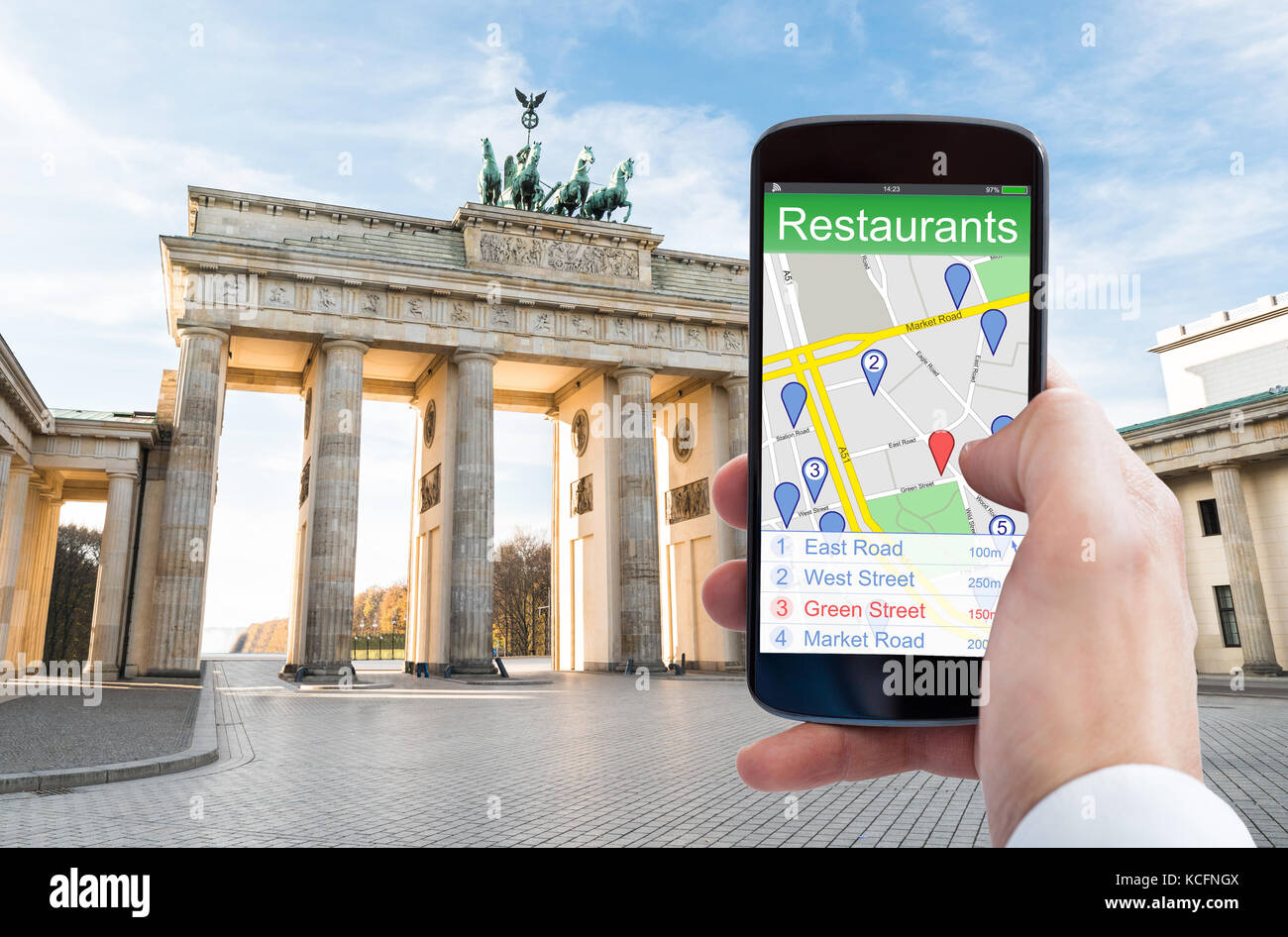 Close-up Of Person's Hand Using GPS Navigation On Cellphone To Find ... Close-up Of Person's Hand Using GPS Navigation On Cellphone To Find ...