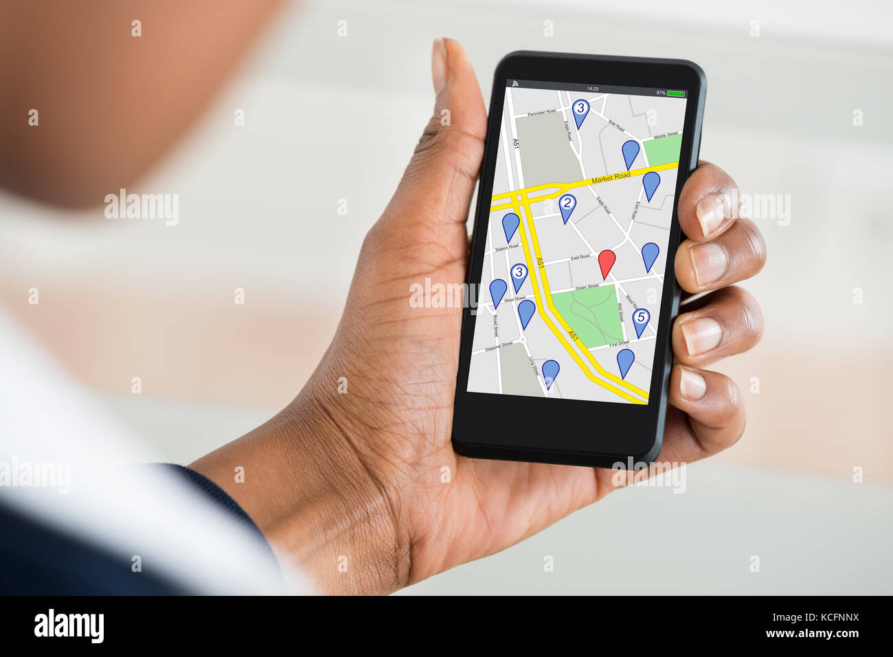 Close Up Of Woman's Hand Holding Mobile Phone With Various Location ...
