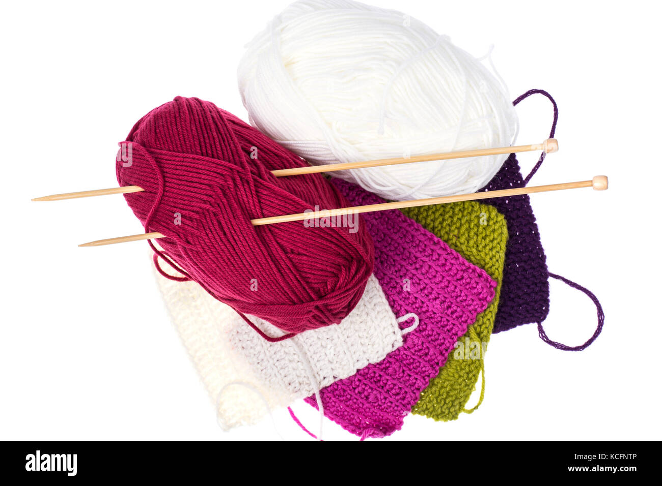 Skeins of thread and knitting wooden needles for needlework Stock Photo ...