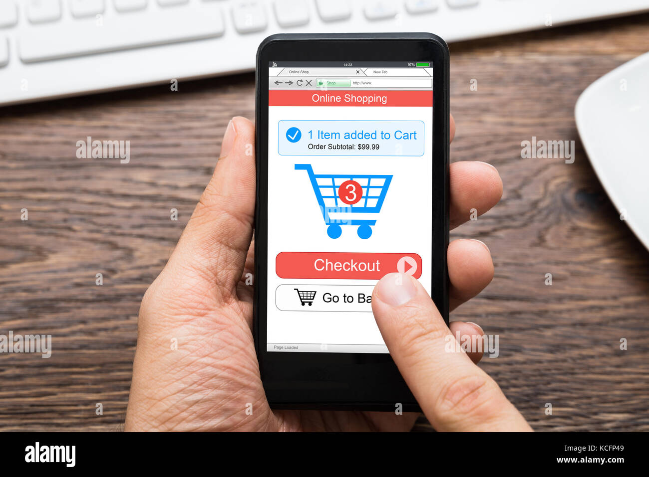 Close-up Of A Person's Hand Adding Items In Shopping Cart On Online ...