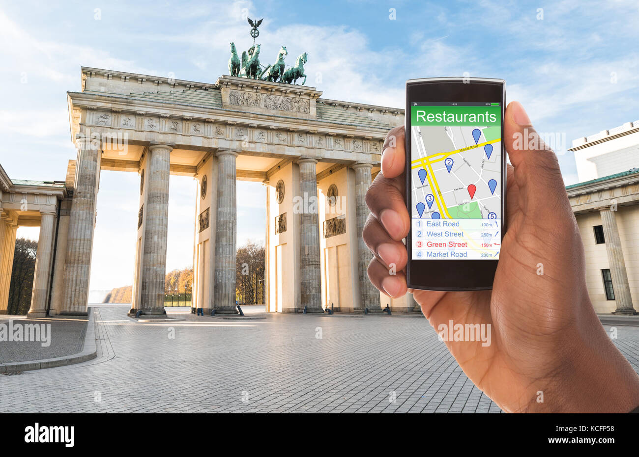 Close-up Of A Person's Hand Searching Restaurants On His GPS Map With ...
