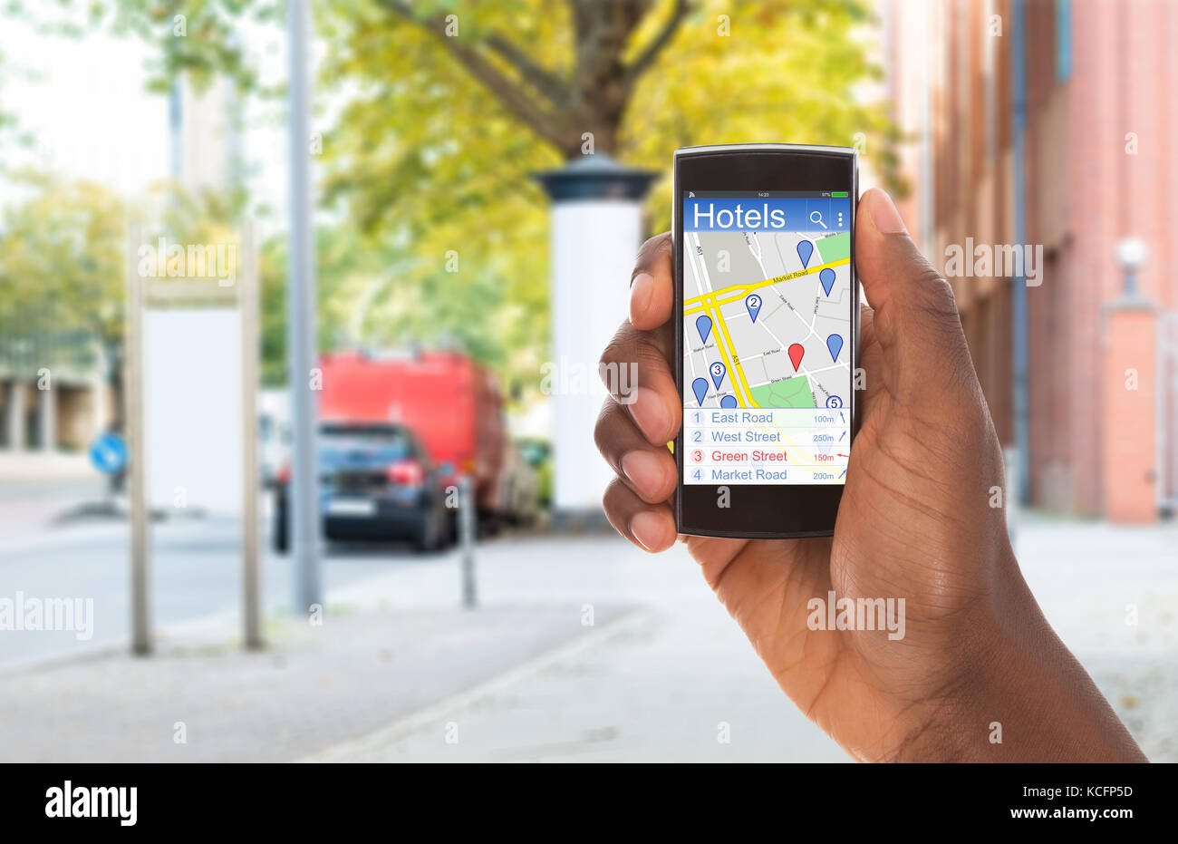 Person using a phone map hi-res stock photography and images - Alamy