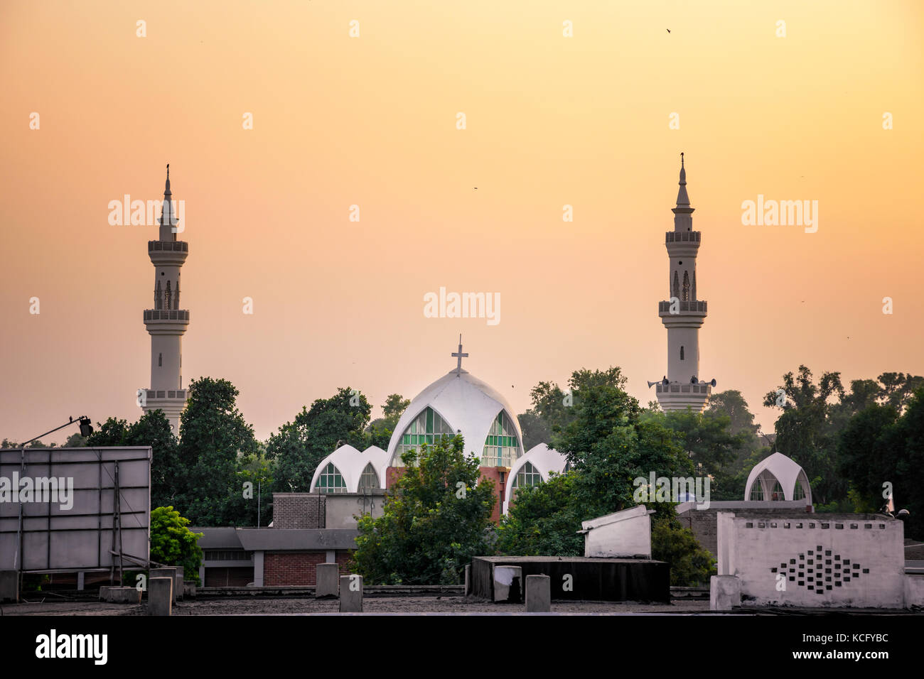 View of mosque and church together in Peshawar Stock Photo - Alamy