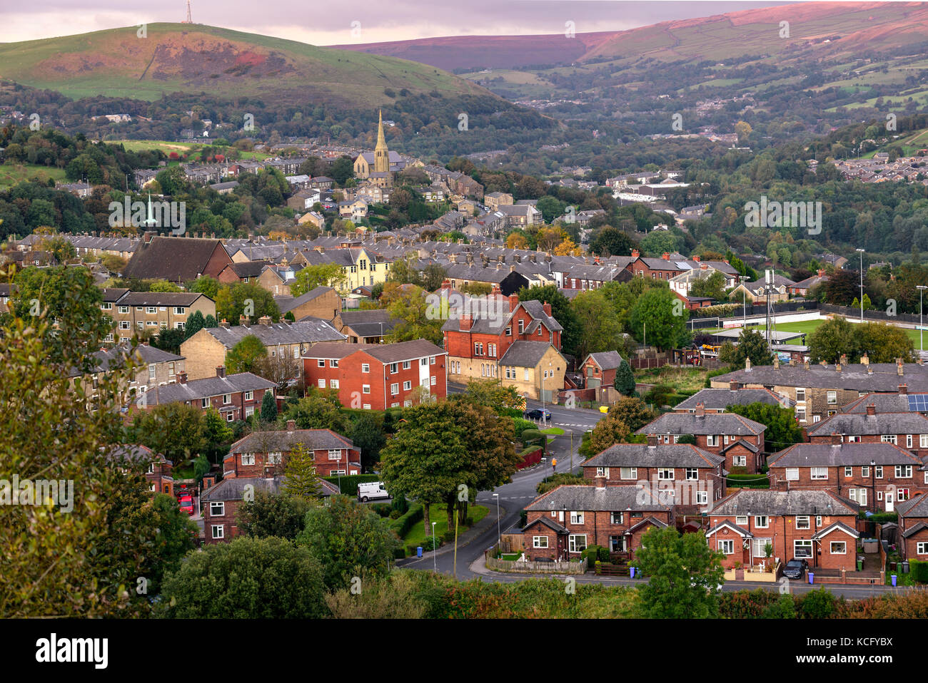 Scene of typical traditional English country village with church in the ...