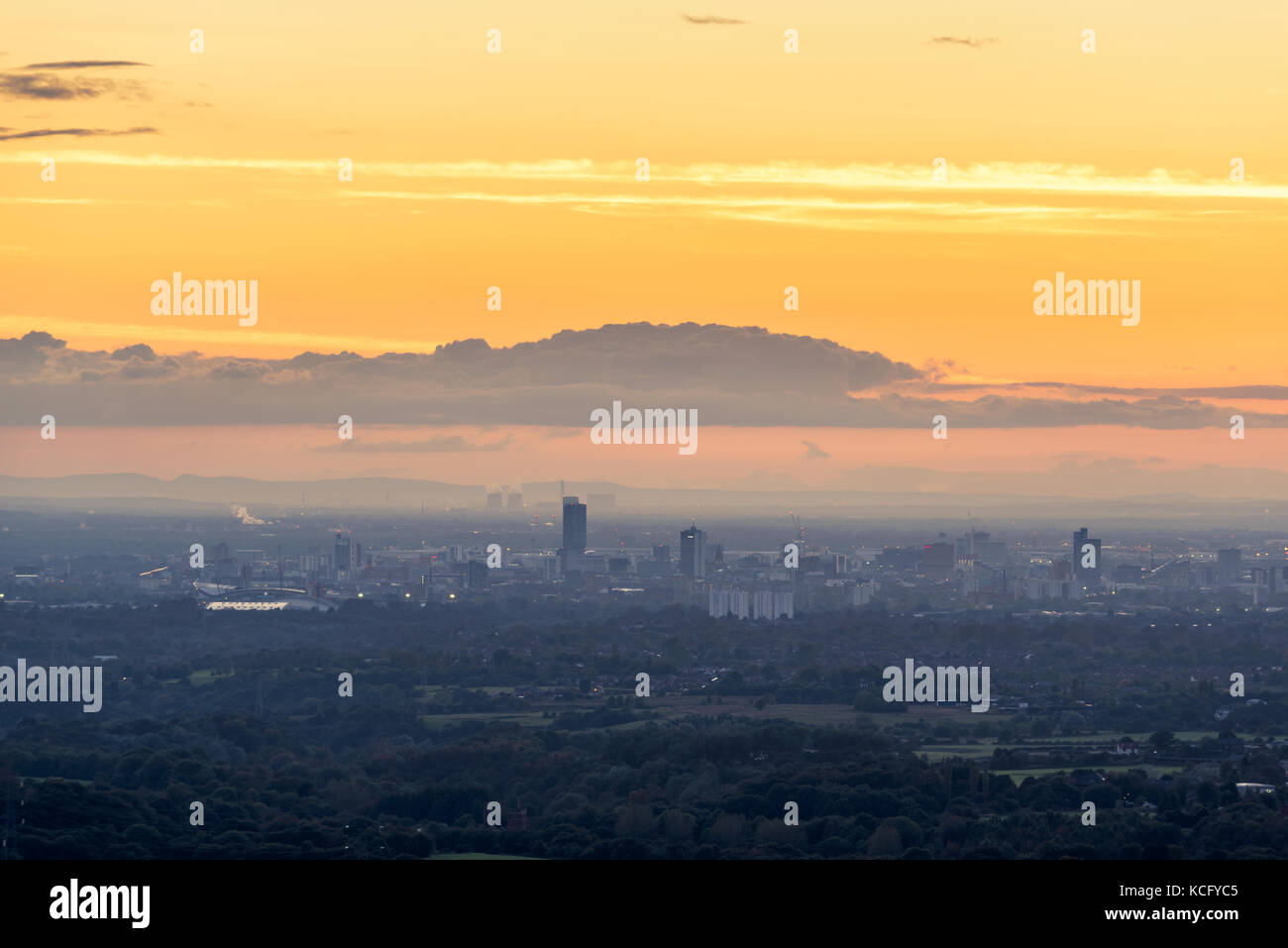 Aerial view of Manchester city and its skyline at sunset Stock Photo ...