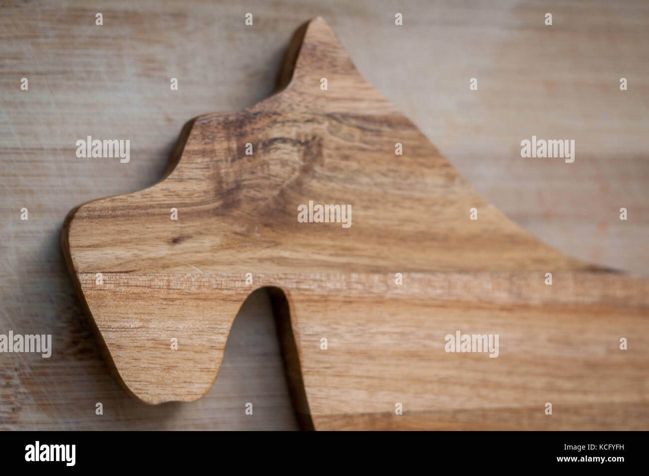 close up of a dog shaped wooden butcher block Stock Photo - Alamy