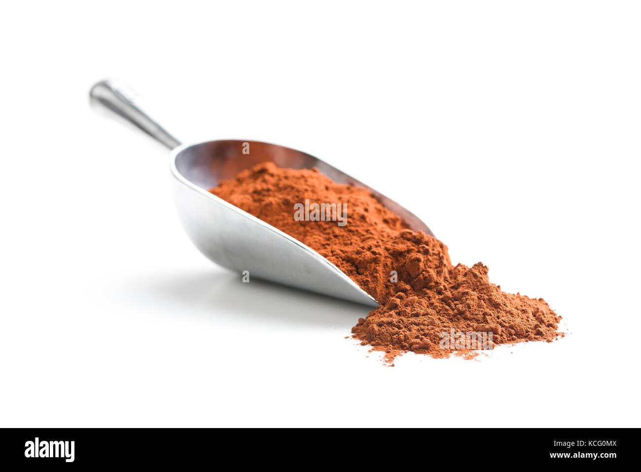 Tasty cocoa powder in scoop isolated on white background Stock Photo ...