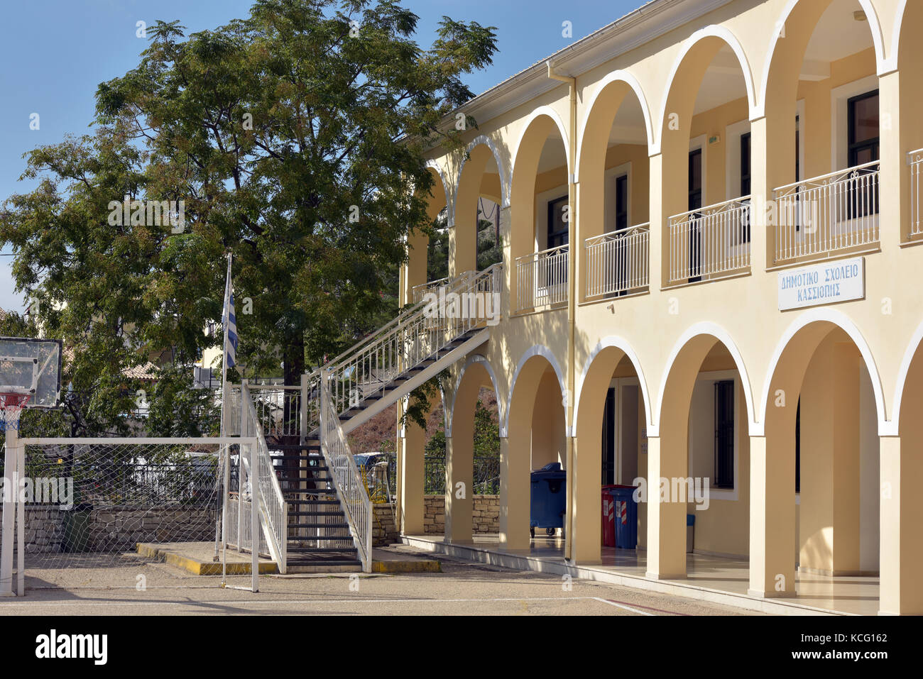 A greek school building with several arched construction on first and ...
