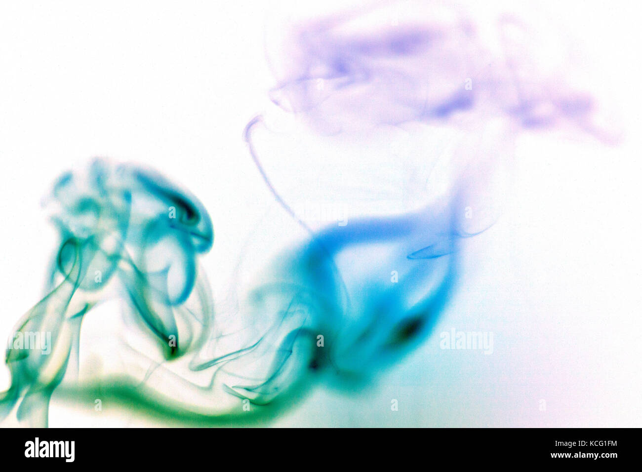 Colorful smoke on white background Stock Photo - Alamy