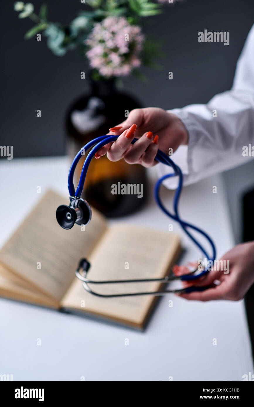 A stethoscope in the hands Stock Photo - Alamy