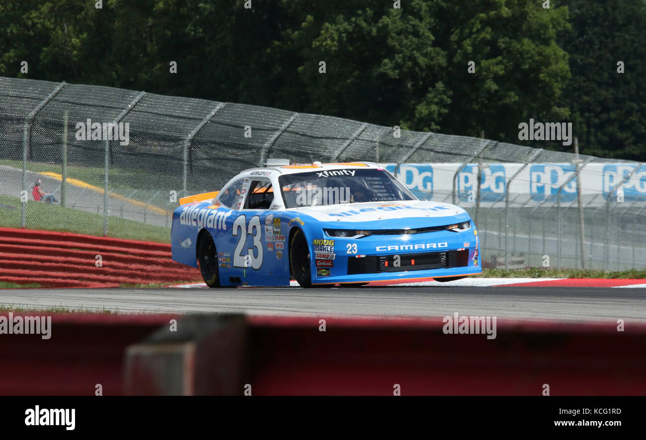 Curb hopping. Spencer Gallagher. Car 23. NASCAR XFINITY Qualifying ...