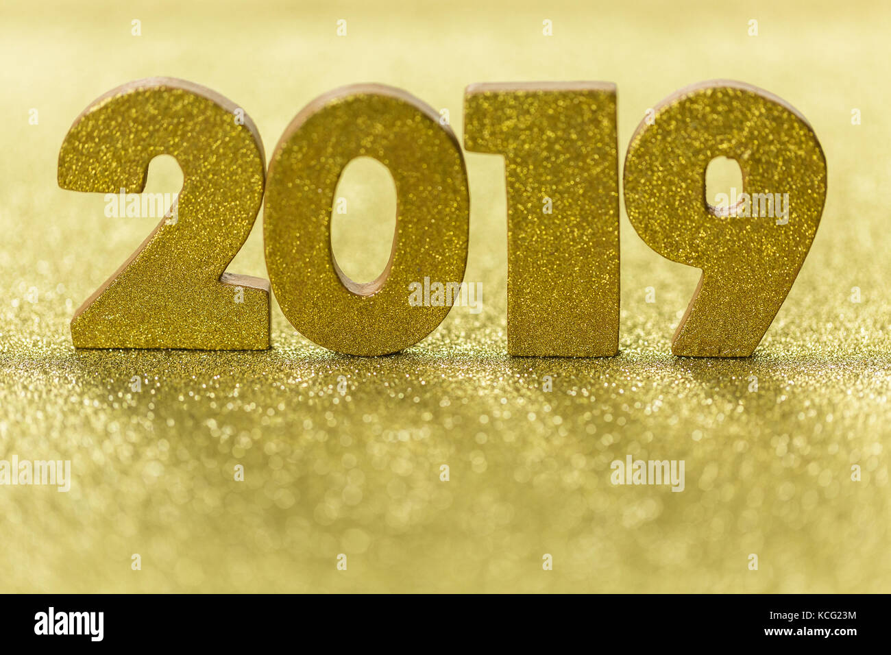 Gold numbers of 2019 year on a gold background Stock Photo - Alamy