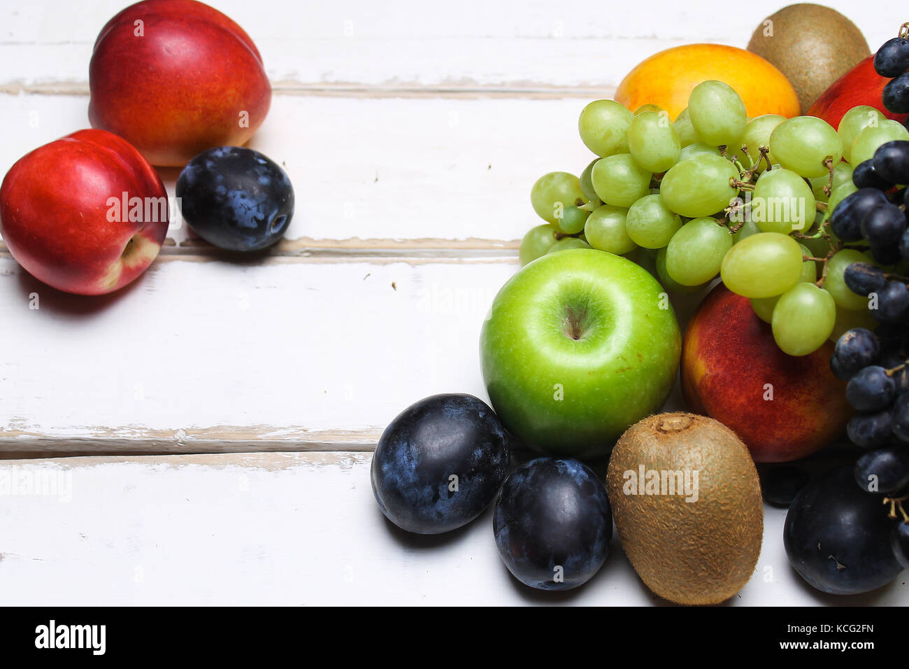 A handful of fruit lying on the table Stock Photo - Alamy