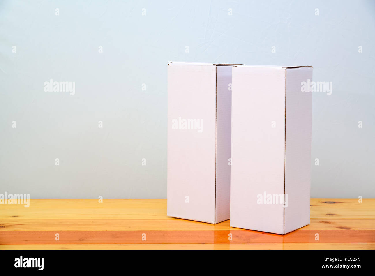 Empty two Package white cardboard box mock up for long items on bright ...