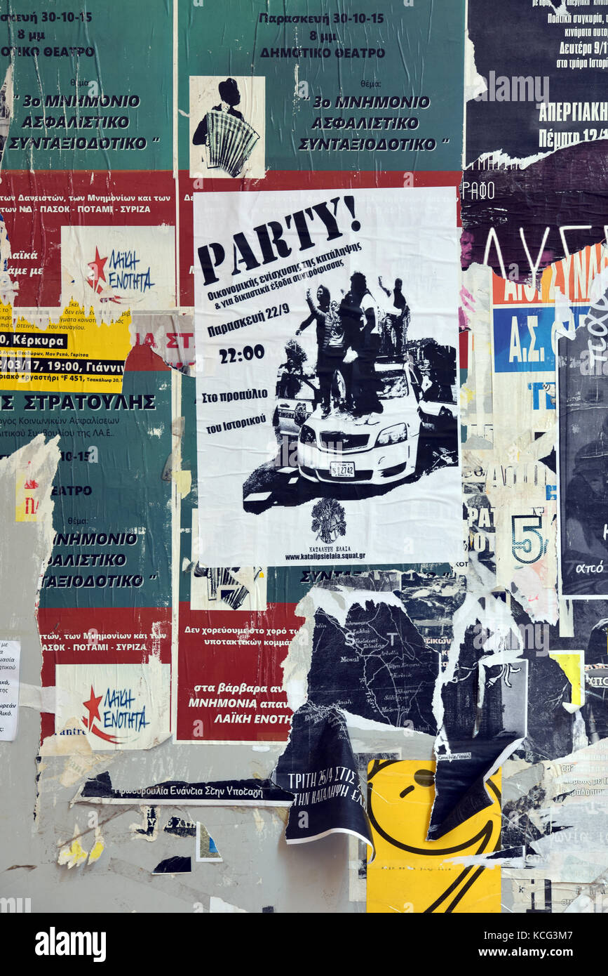 An overcrowded or busy crammed notic or potter advertising board with a ...