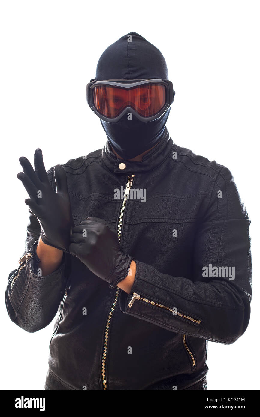 Dangerous burglar dressed in black wearing a mask on head - isolated ...