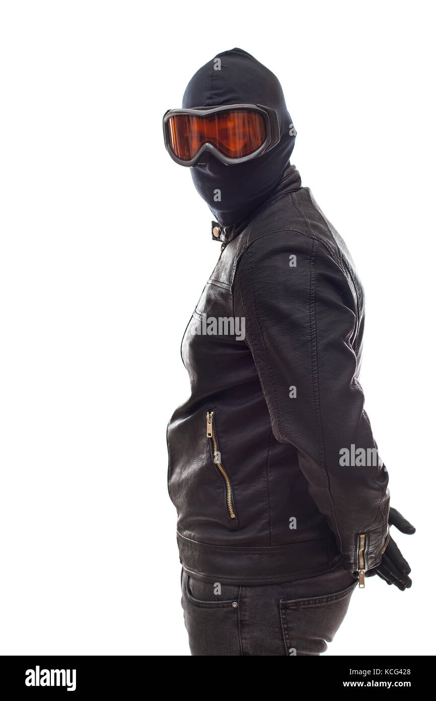 Dangerous burglar dressed in black wearing a mask on head - isolated ...