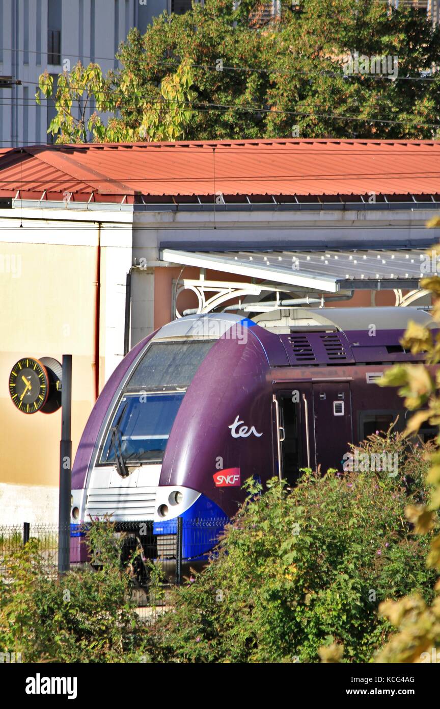 SNCF regional train, Alstom, entering a train station. Grenoble, Isere ...