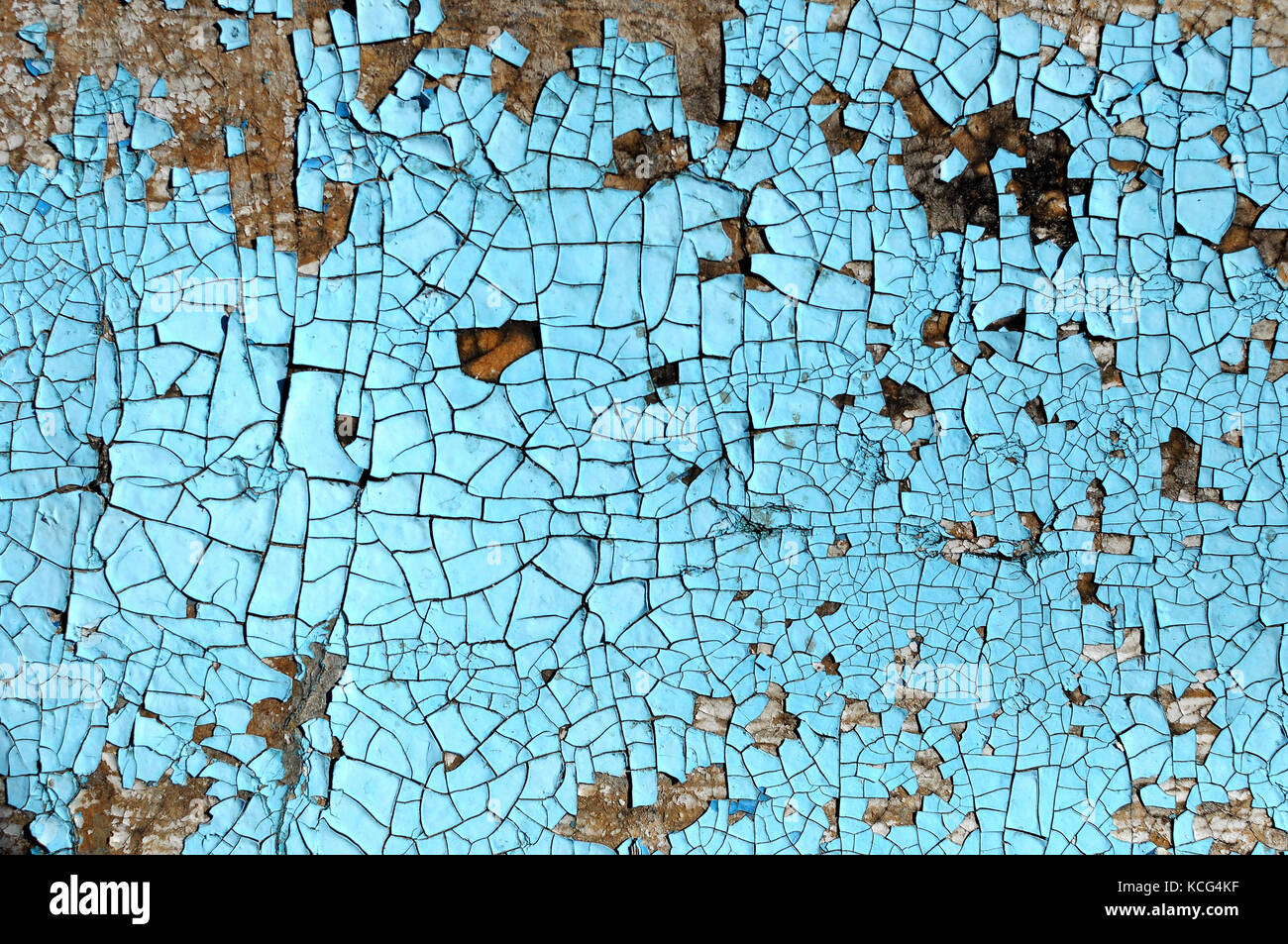 Rustic hardboard texture with scratches, cracks and blue peeling paint ...