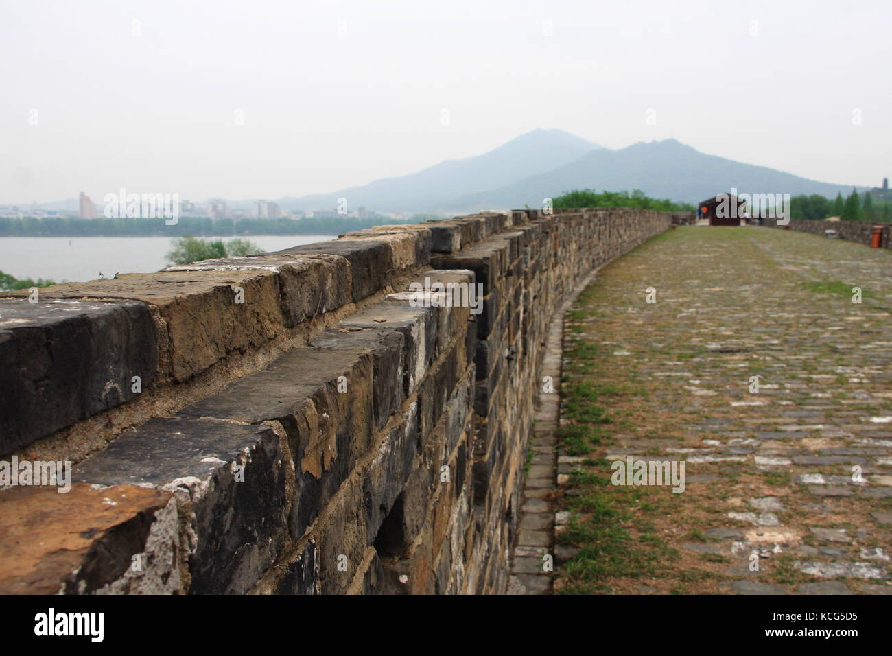 the Nanjing Old City Wall with a view of the City and Mountain. Nanjing ...