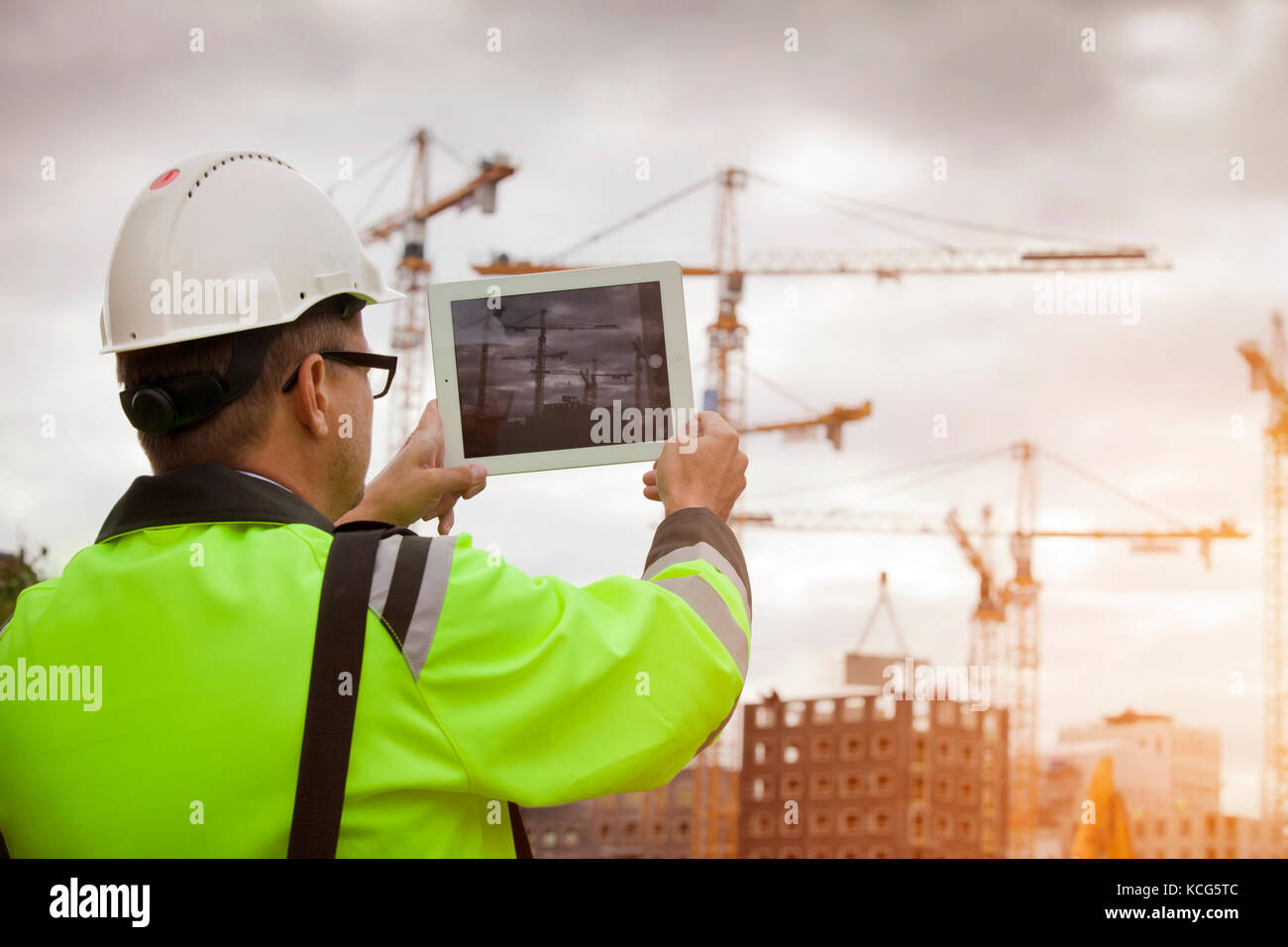 Construction engineer wearing safety vest Stock Photo - Alamy
