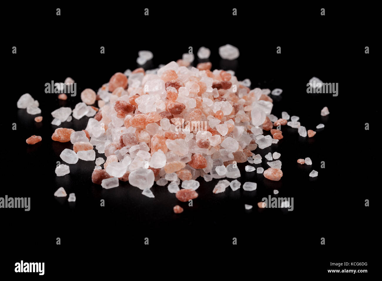 Pink Himalayan Salt Crystals on Black Background Stock Photo - Alamy