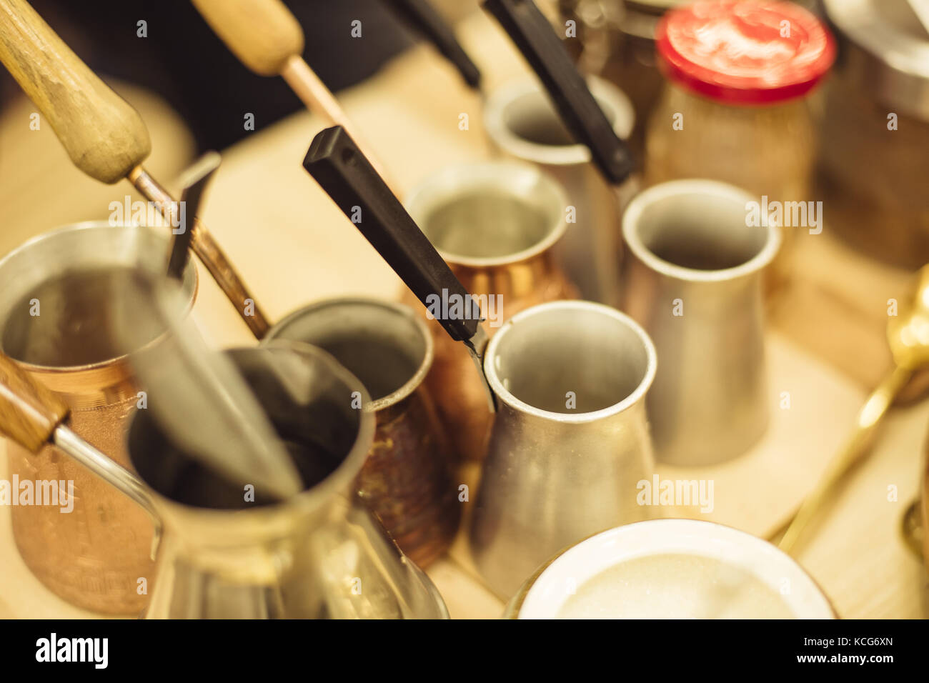 Jezve placed in sand Stock Photo - Alamy