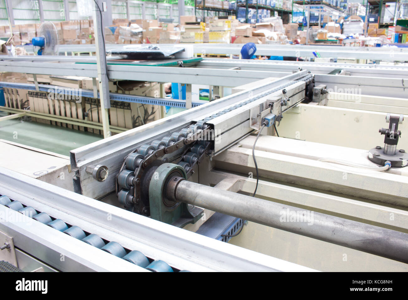 the chain drive shaft Line Conveyor Industrial Stock Photo - Alamy