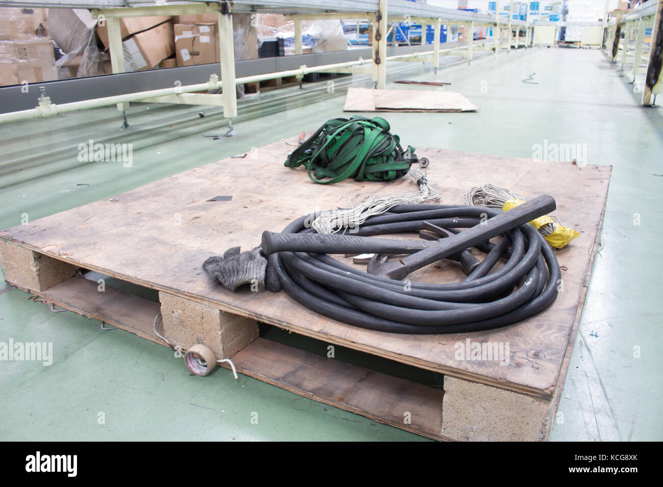 Hammers and wire electric of production line setup Stock Photo - Alamy