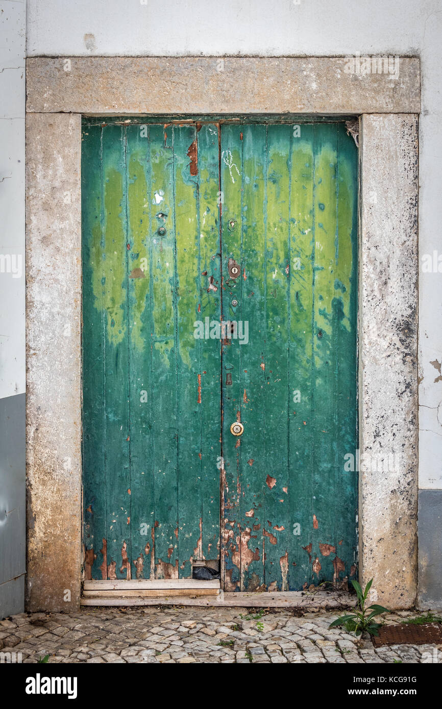 Old green vintage door in decay Stock Photo - Alamy